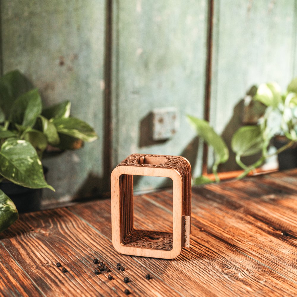 Tube stand made of recycled cardboard for one tube of Kampot pepper ...